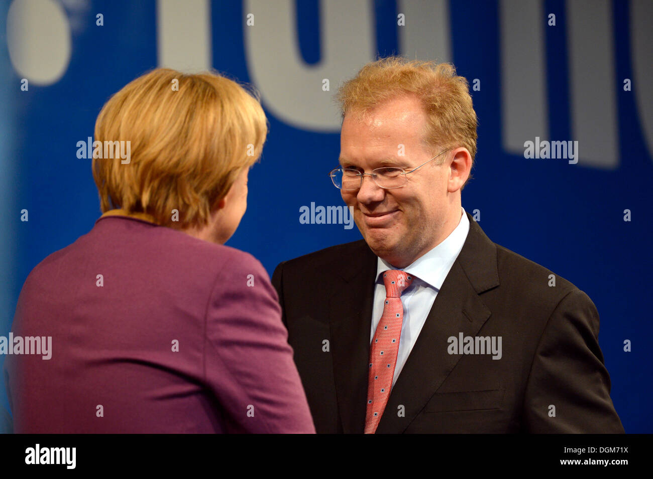 German Chancellor Angela Merkel, CDU, greeting Sebastian Turner ...