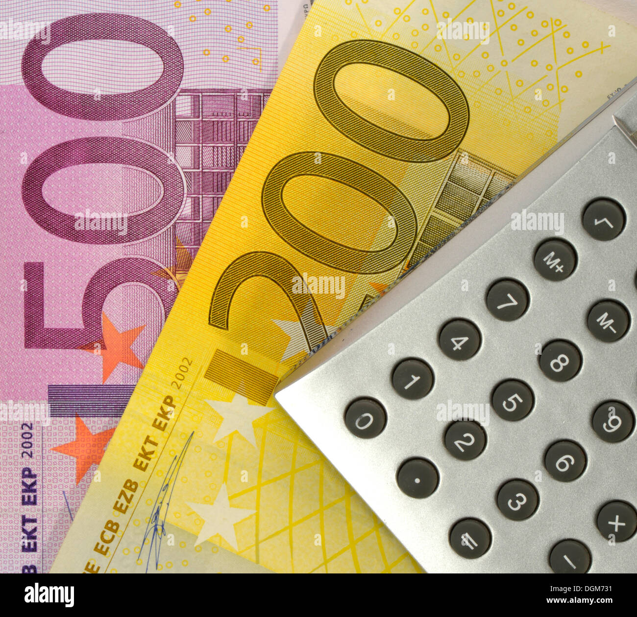 Euro banknotes and a calculator Stock Photo - Alamy