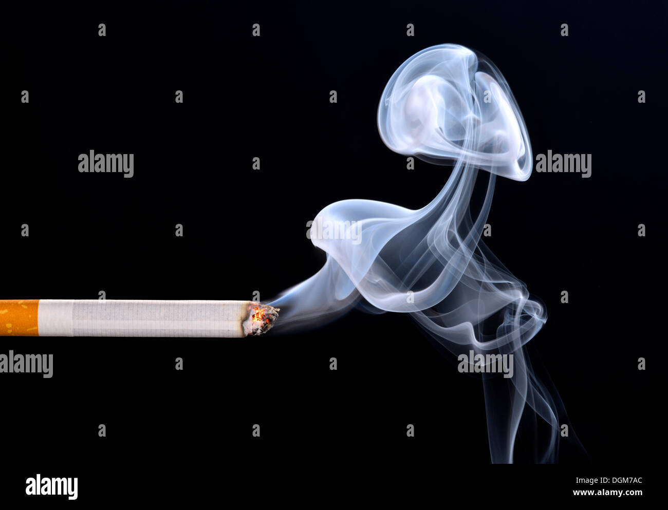 Cigarette with smoke Stock Photo - Alamy