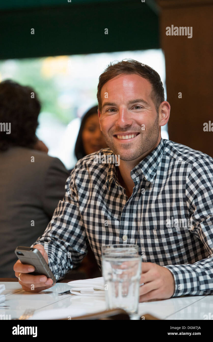 Young men drinking bar new york hi-res stock photography and images - Alamy