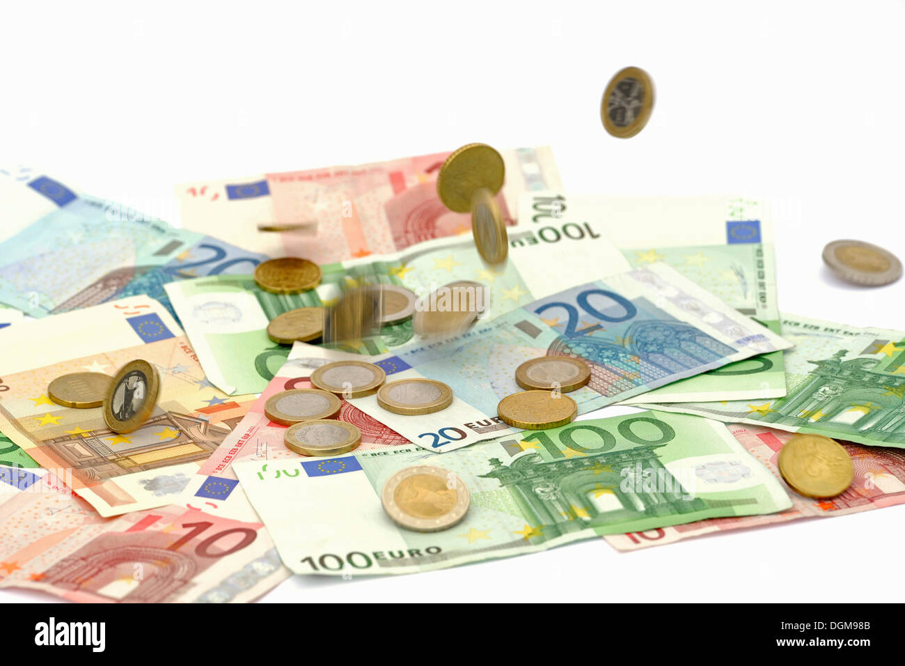 Euro coins falling on euro banknotes, raining money Stock Photo - Alamy