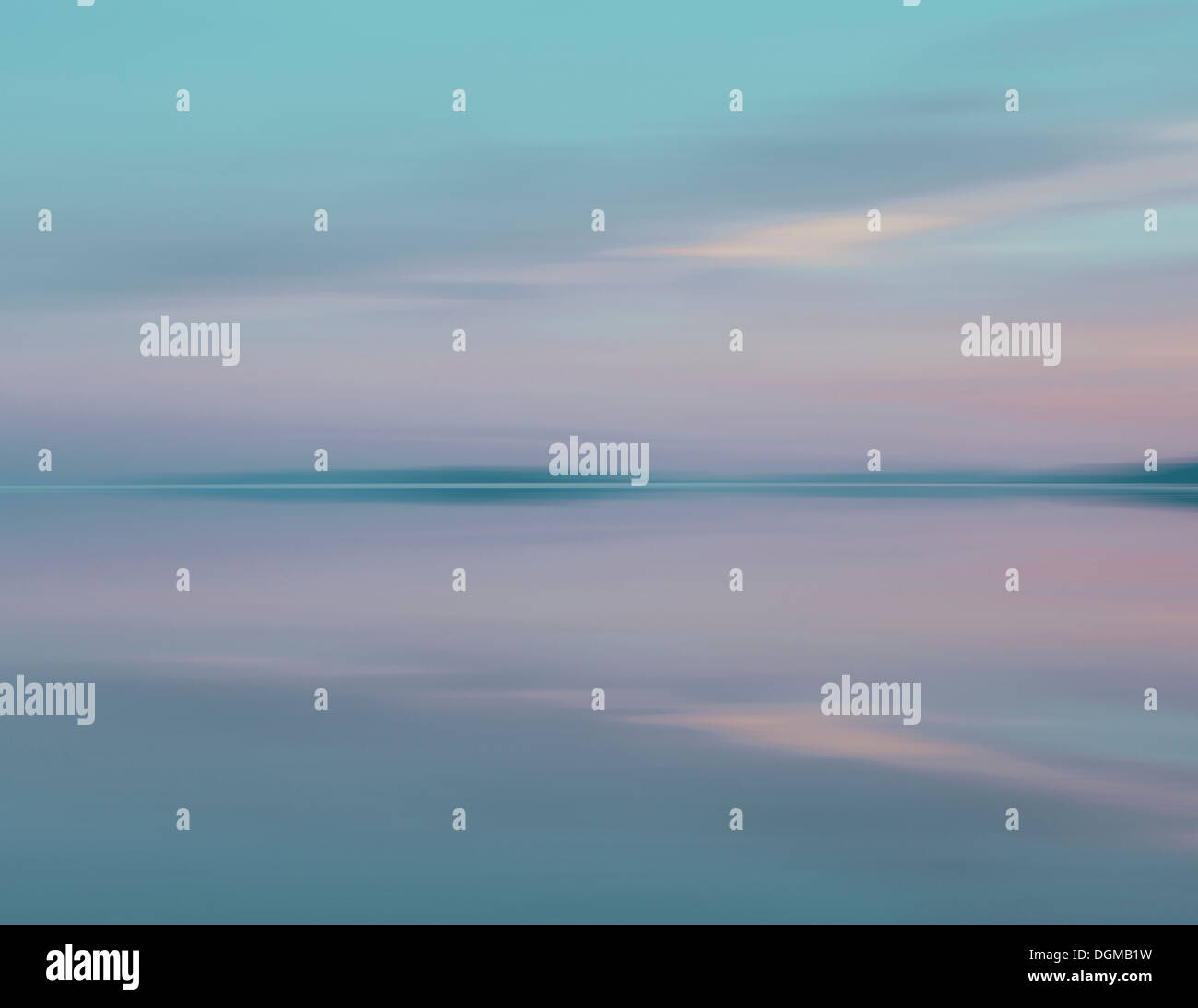 Shallow water over the surface at the Bonneville Salt Flats at dusk ...