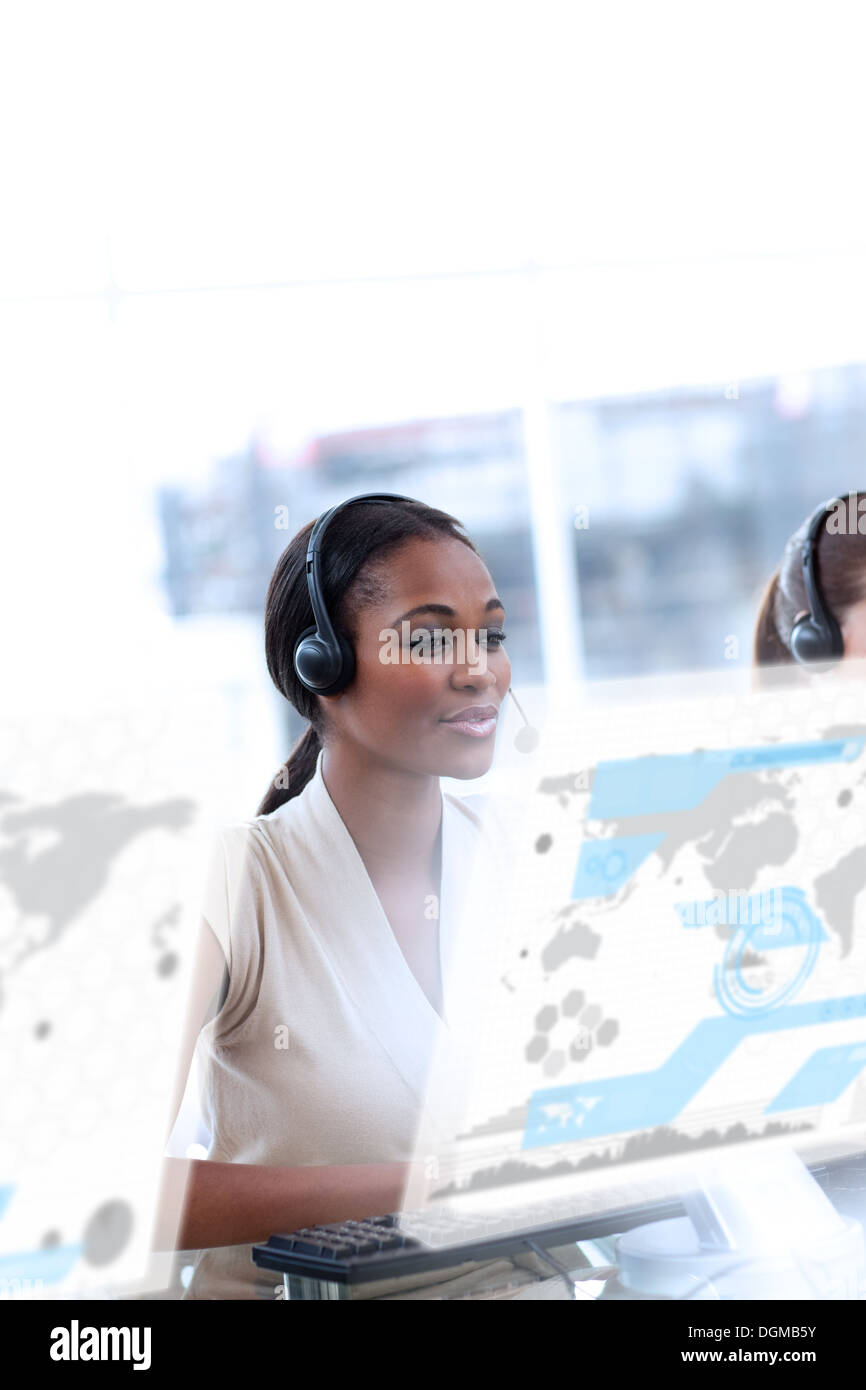 Smiling call center employee using futuristic interface hologram Stock ...