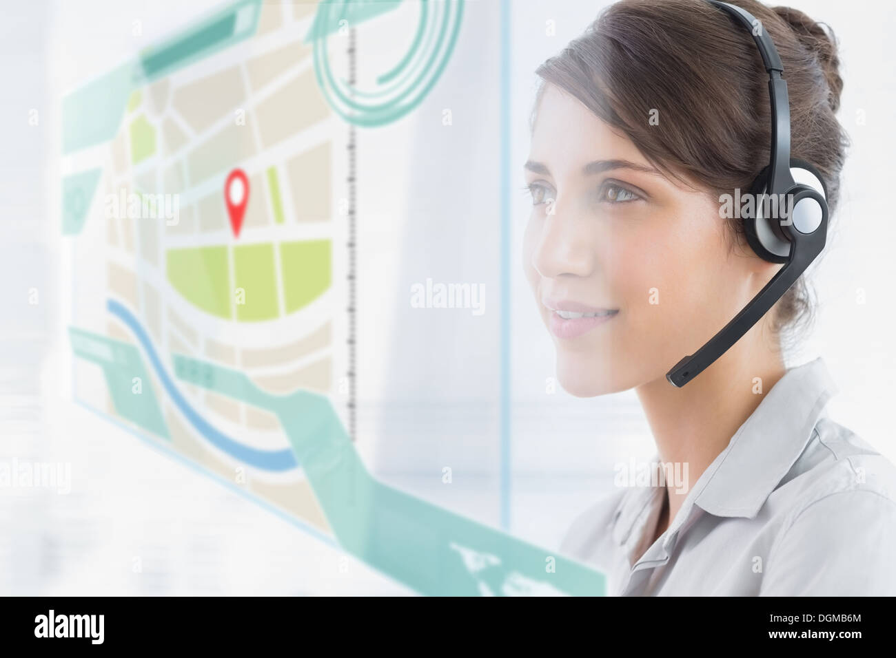 Happy call center employee using futuristic street map interface Stock ...