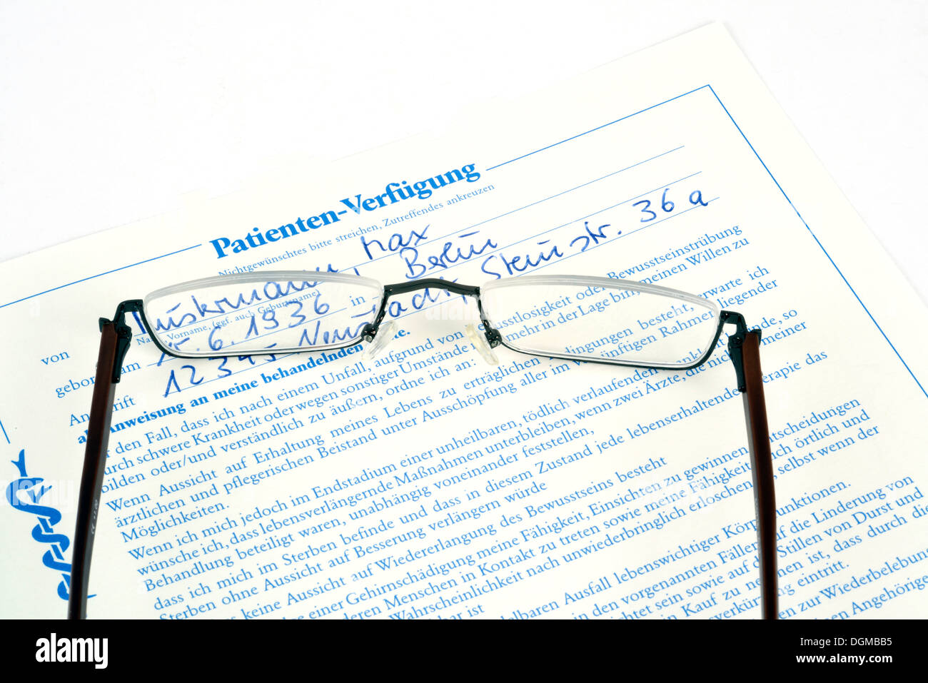 Reading glasses lying on a German patient's provision Stock Photo - Alamy