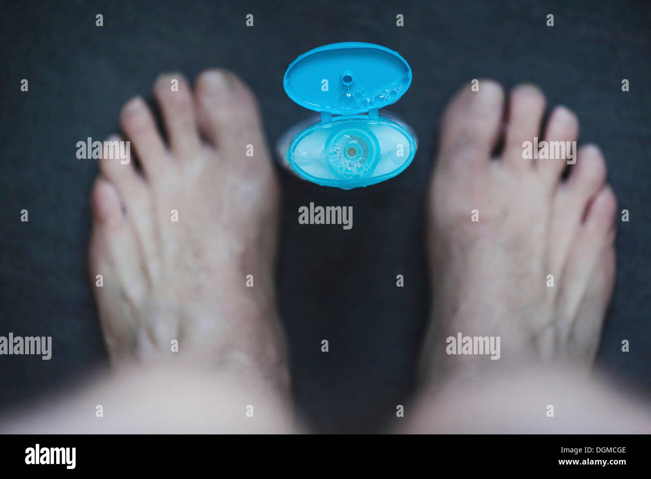 Showering feet hi-res stock photography and images - Alamy