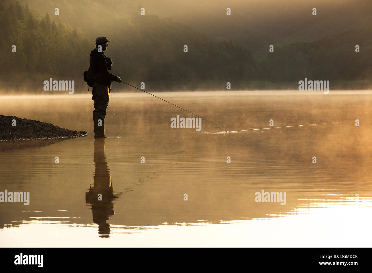 Fish fishes angler fisherman pole hi-res stock photography and images ...