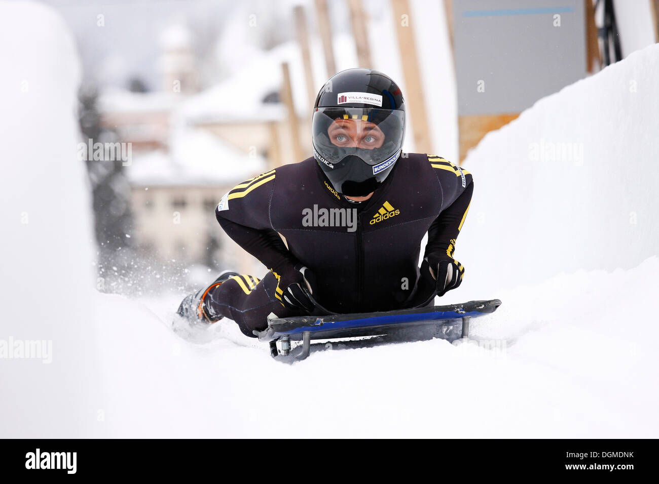 Skeleton, crossing finish line, driver looking at his time, natural ice ...