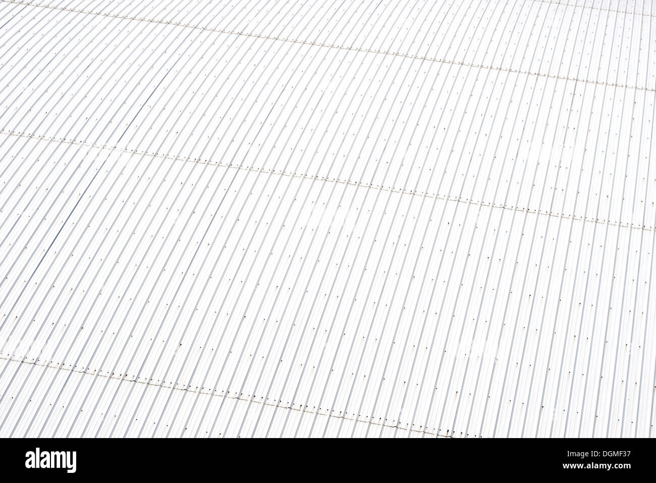 abstract background created by the surface of a metal roof industrial ...