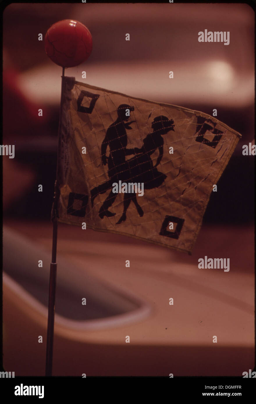 PENNANT OF SQUARE-DANCE CLUB FLIES FROM AUTO AERIAL AT THE CENTURY ...