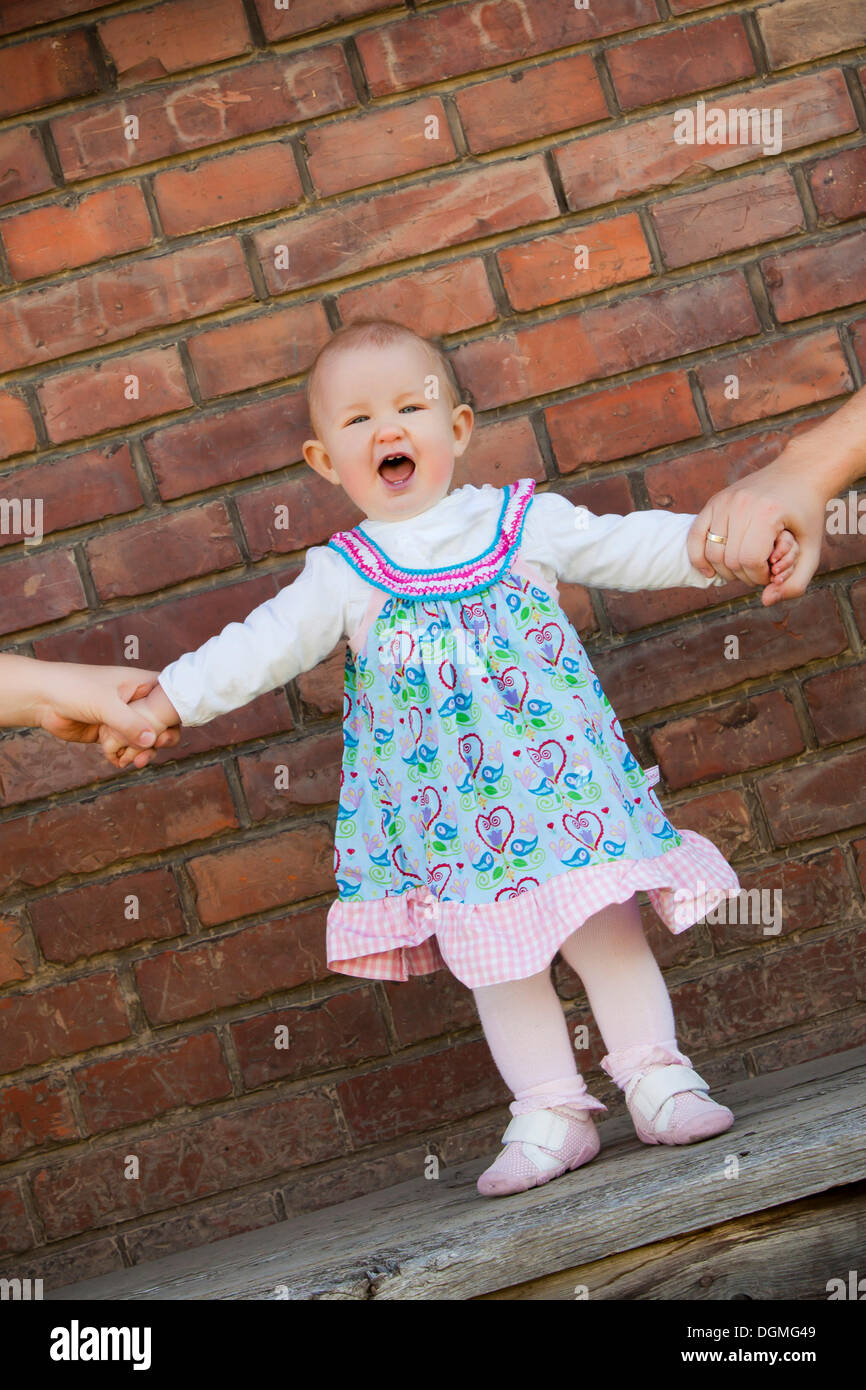 Hands held out hi-res stock photography and images - Alamy