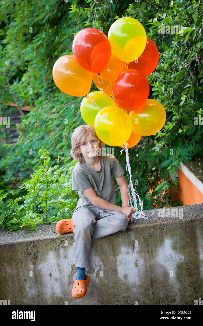 Balloons boy hi-res stock photography and images - Alamy