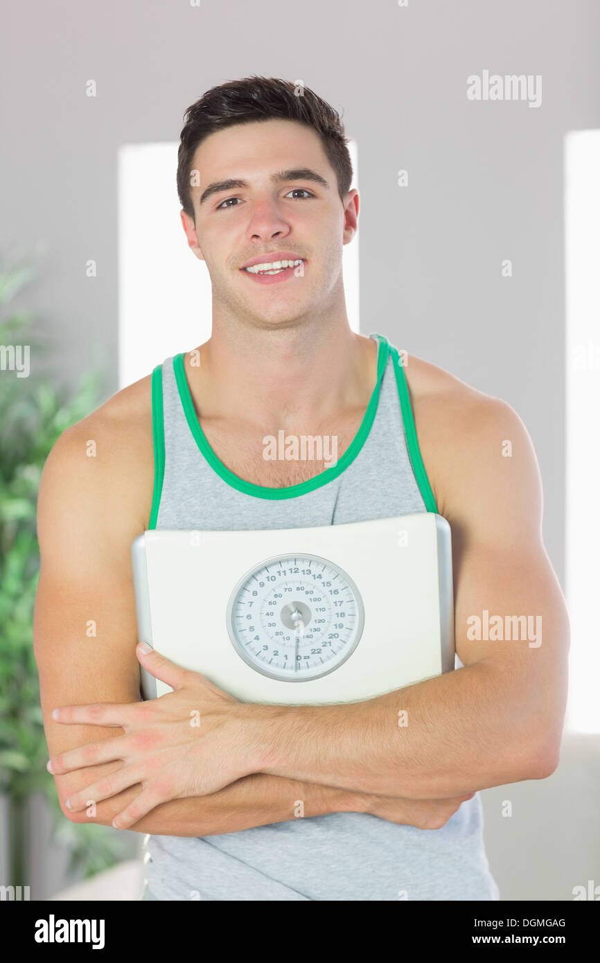 Man and scales hi-res stock photography and images - Alamy