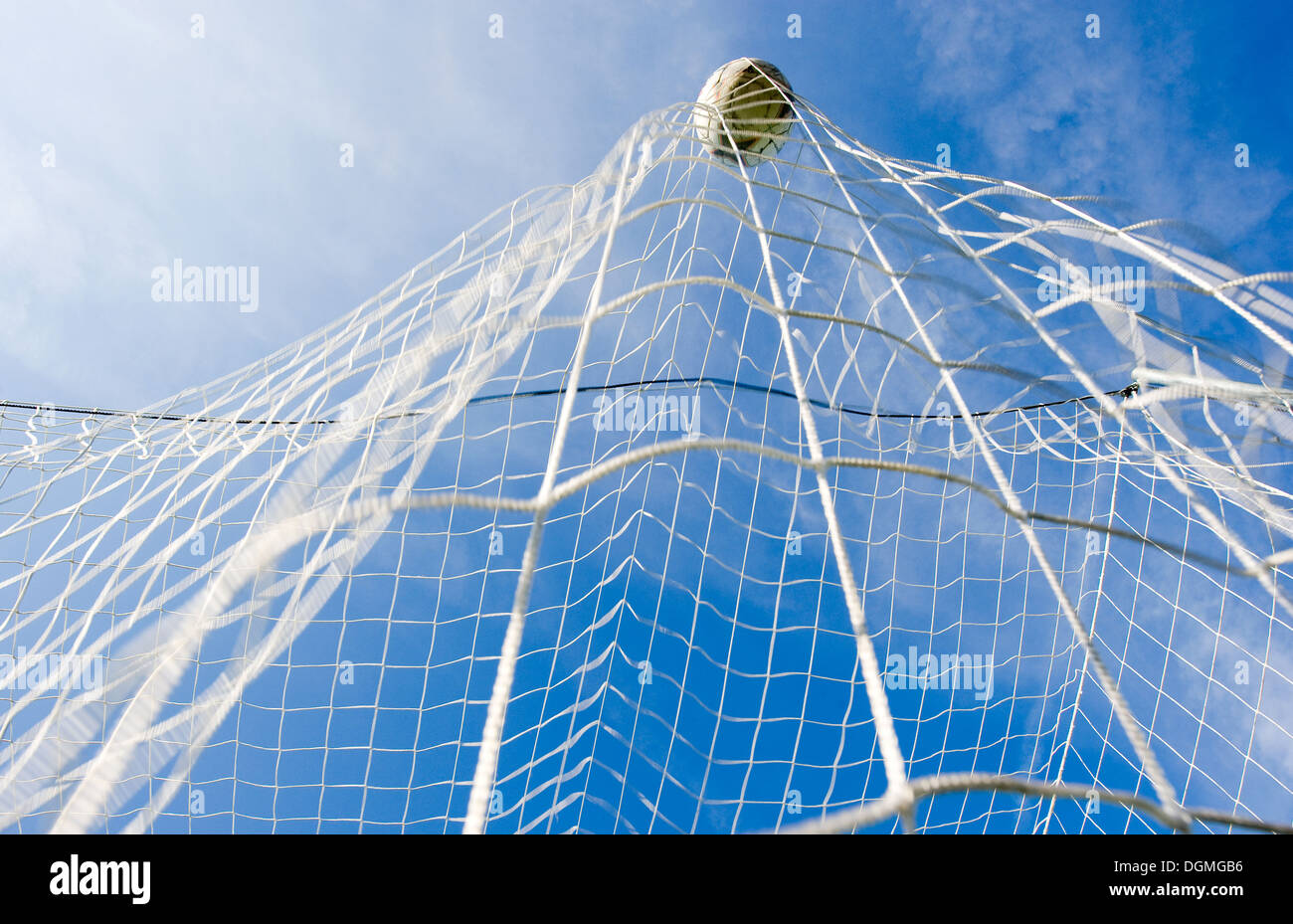 A soccer ball hits the net Stock Photo - Alamy