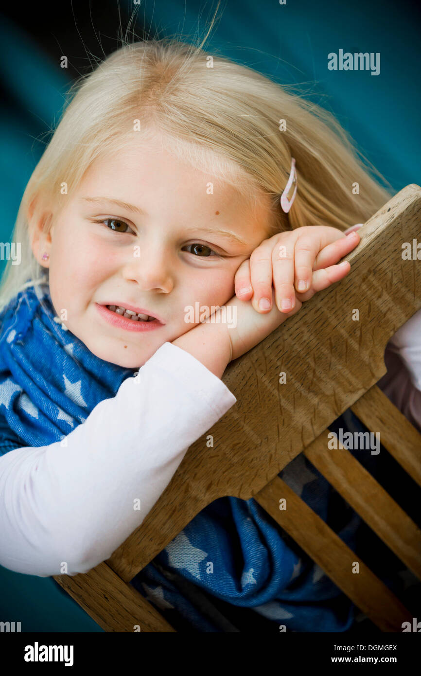 Caucasian teen girl leaning on chair hi-res stock photography and ...