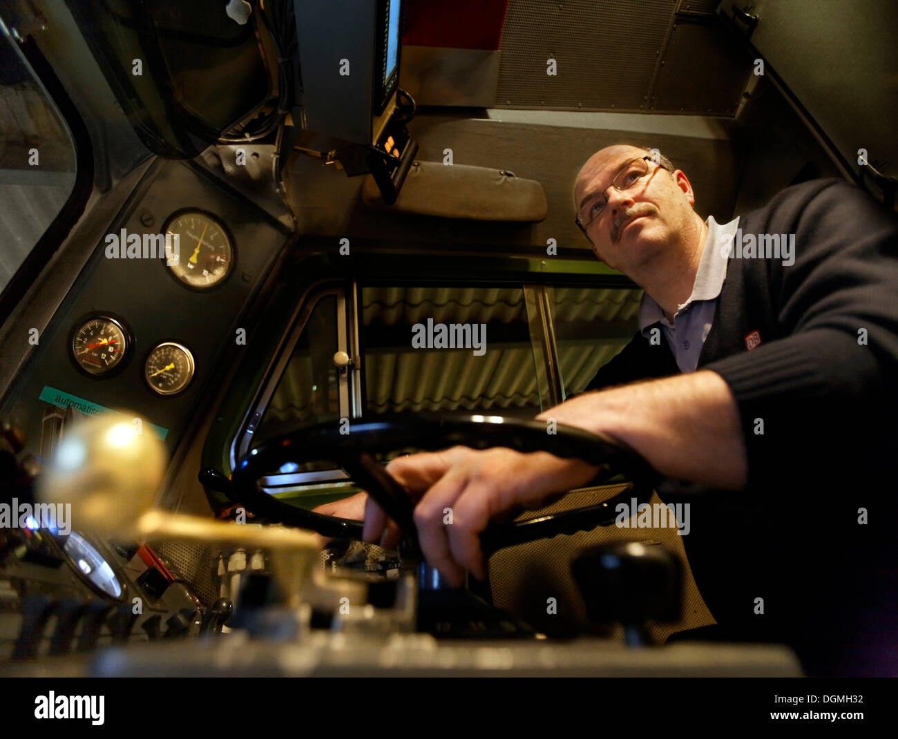 Peter Deissler, a train driver driving a 218 series diesel locomotive ...
