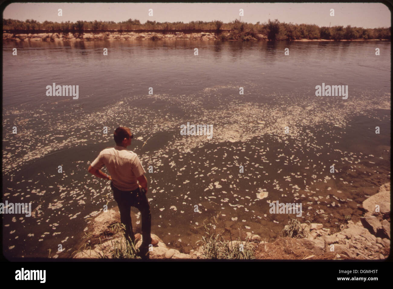 Waste materials are seen floating on the Colorado River, approximately ...