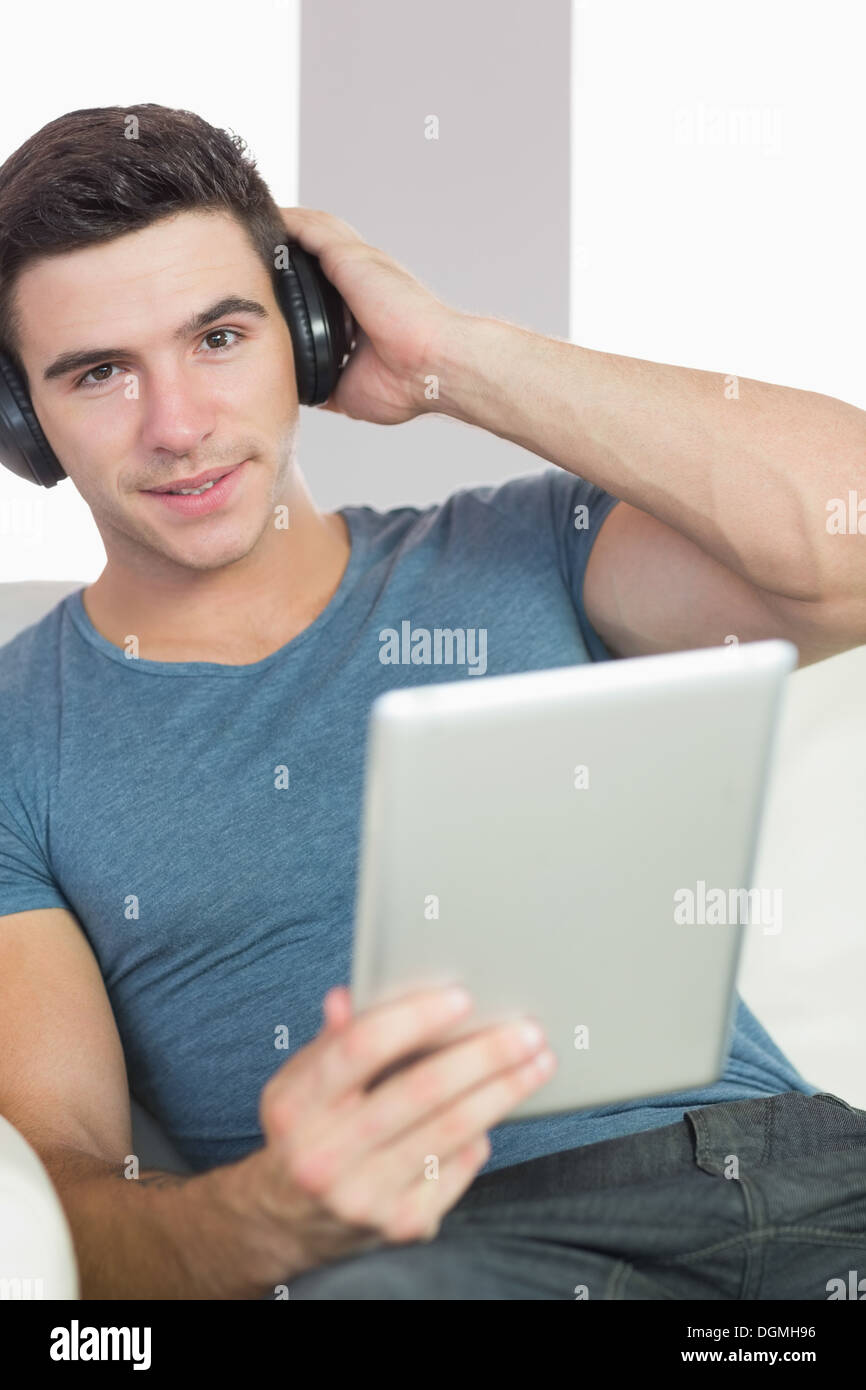 Happy handsome man smiling using hi-res stock photography and images ...