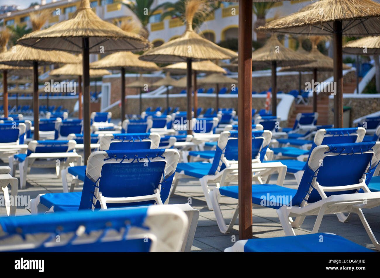 Empty deck chairs at the pool, Son Bou, Menorca, Balearic Islands ...