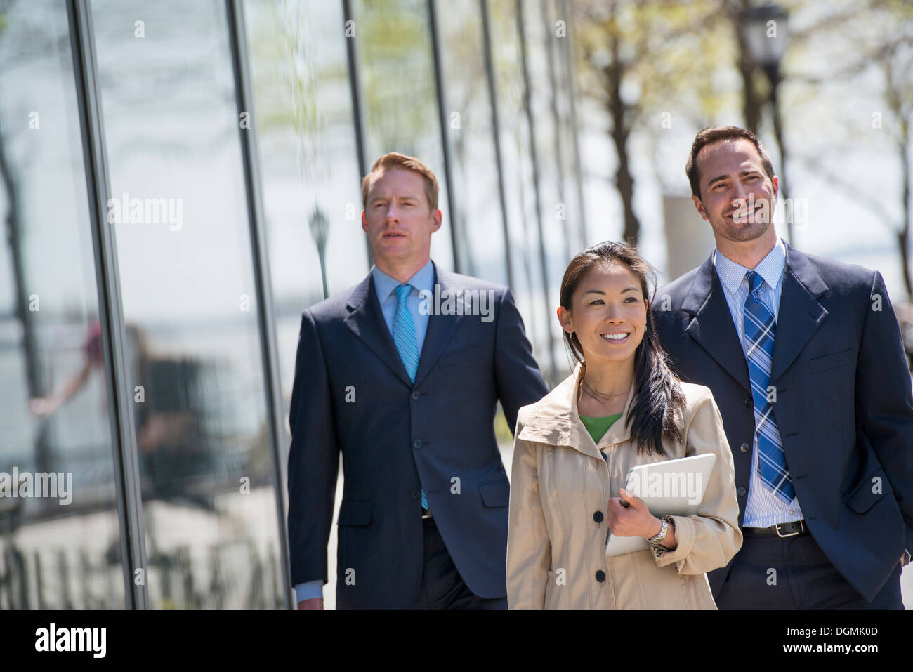 Group businessmen in street hi-res stock photography and images - Alamy