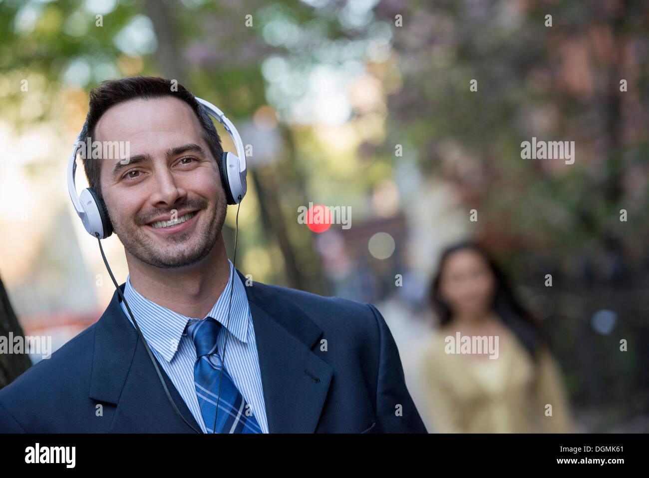 White headphones hi-res stock photography and images - Alamy