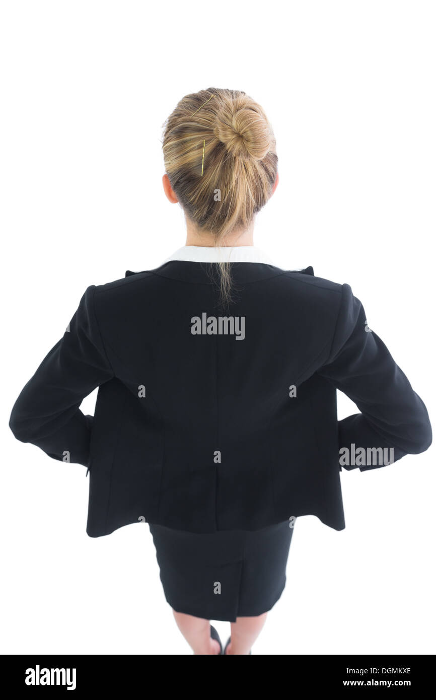 High angle rear view of blonde young businesswoman posing Stock Photo ...