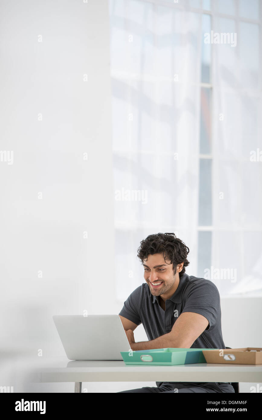 Man sitting indian style hi-res stock photography and images - Alamy