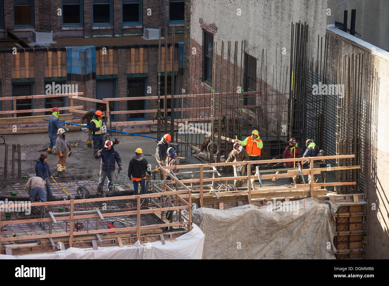 High-rise Building Construction Site, with tradesmen, NYC, USA Stock ...