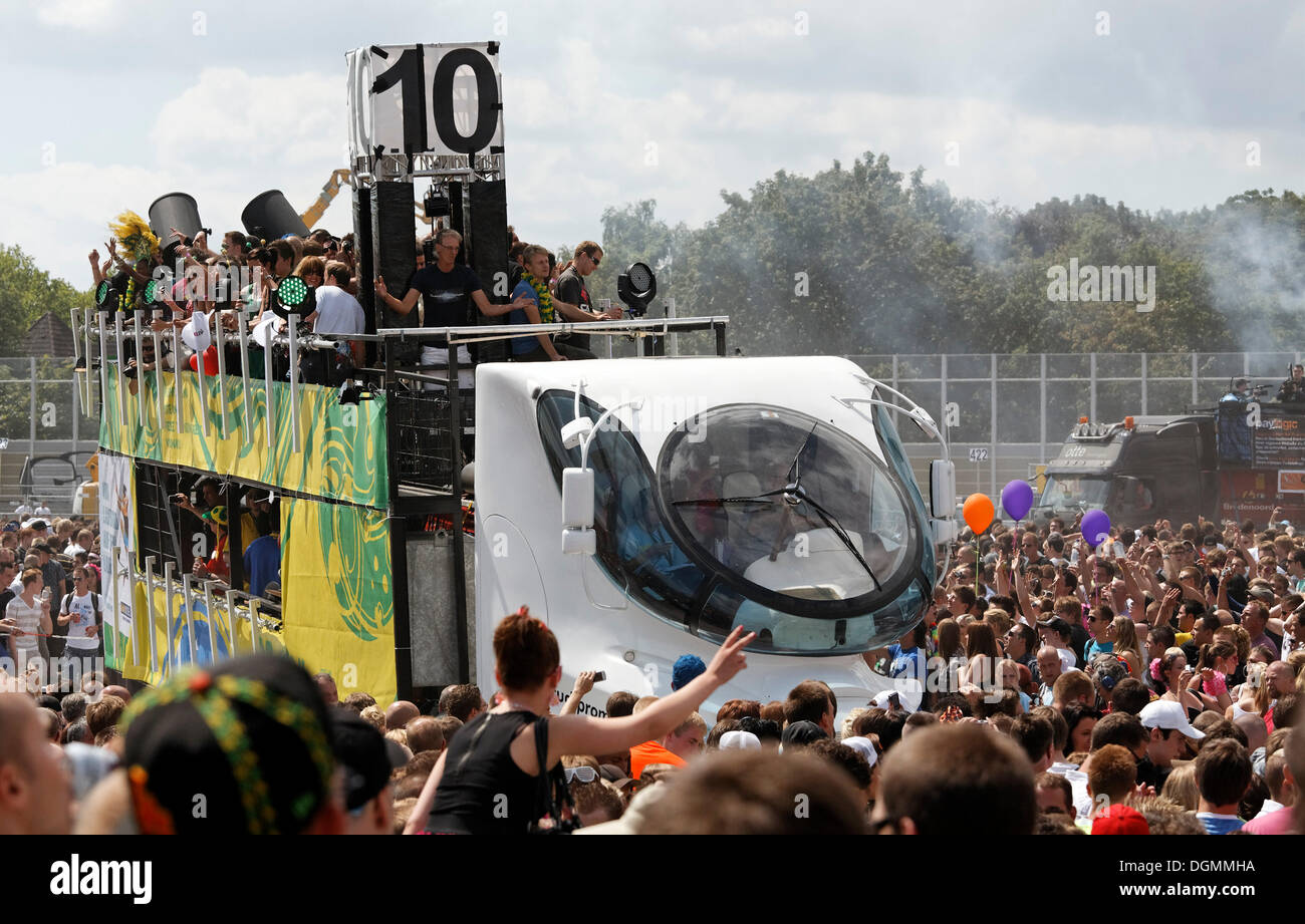 Float in between crowds, Loveparade 2010, Duisburg, North Rhine ...