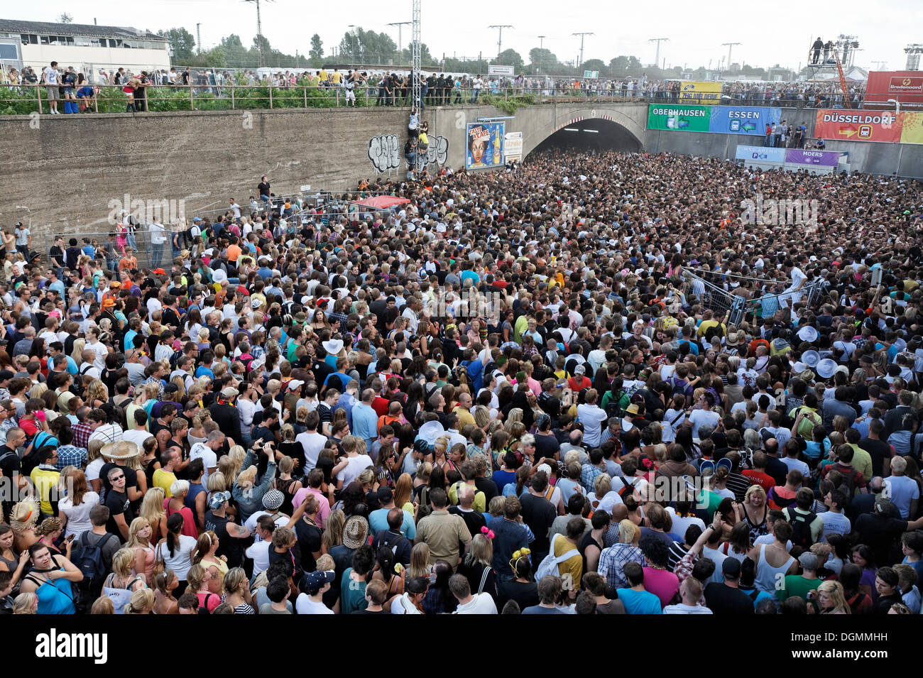 Young people pushing towards the exit causing a jam, mass panic leaving ...
