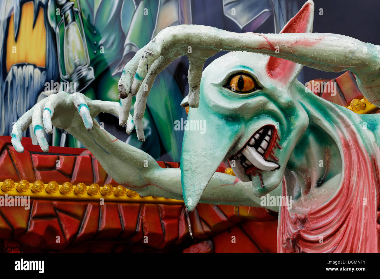 Monster grabbing the audience, horror figure in front of a haunted ...