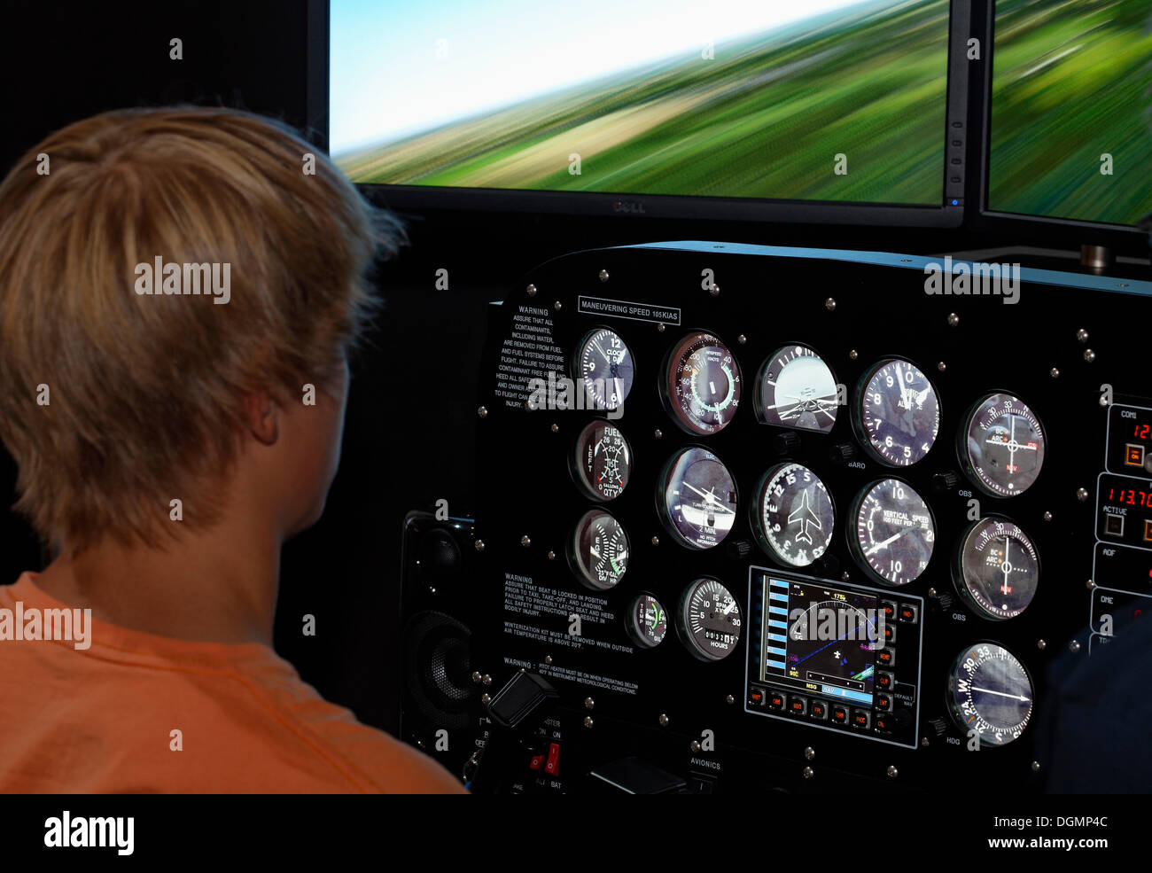 Boy as a pilot in a Prop Cockpit Trainer, flight simulator, IdeenPark ...