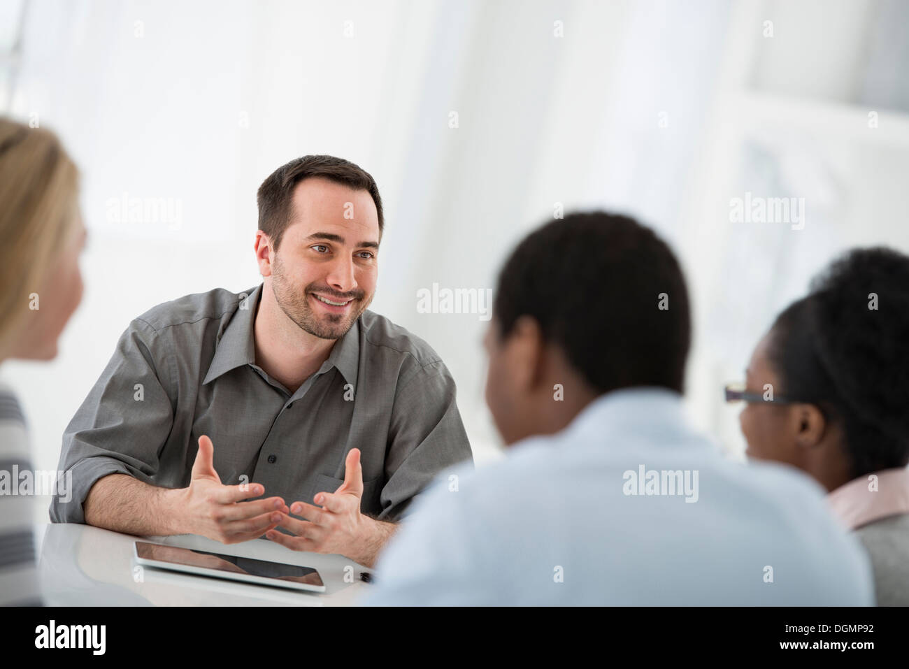 Four men dressed hi-res stock photography and images - Alamy