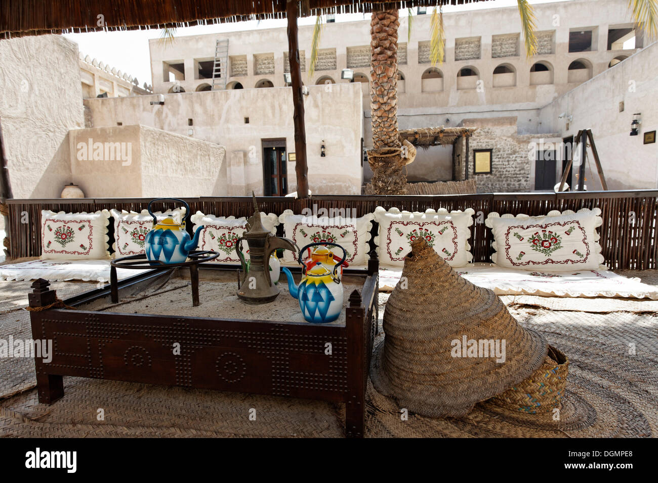 Traditional seating area with straw mats in the courtyard, typical ...