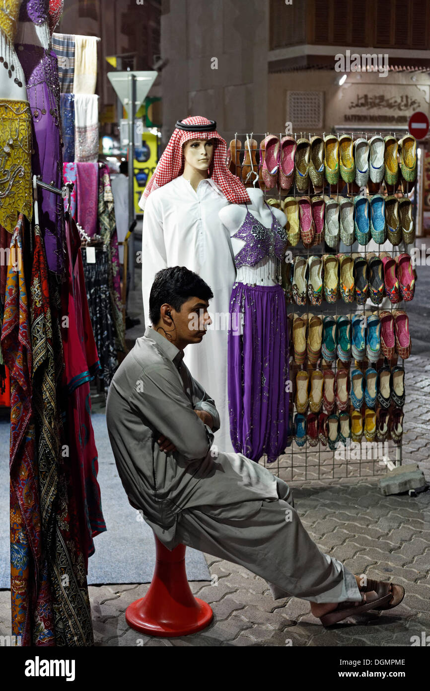 Salesman sitting bored in front of his shop, Deira Old Souk, United ...