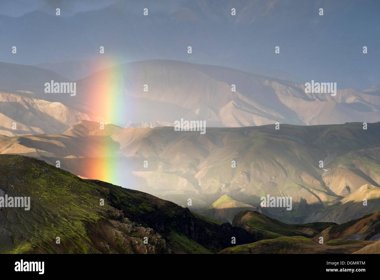 Segment of a rainbow over the rhyolite mountains near the ...
