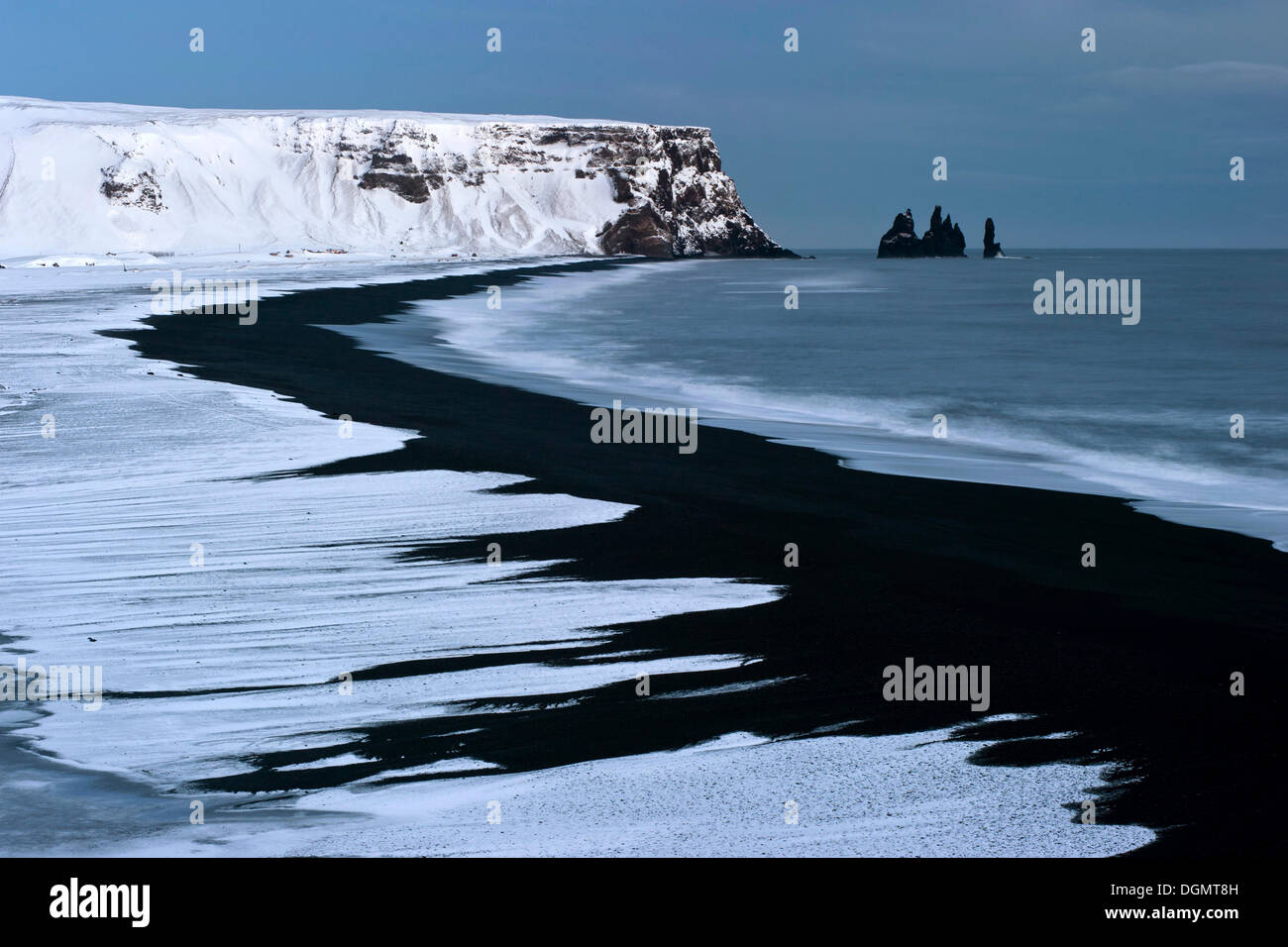 Reynisdrangar pinnacles from the wintry beach at Dyrhólaey, Iceland ...
