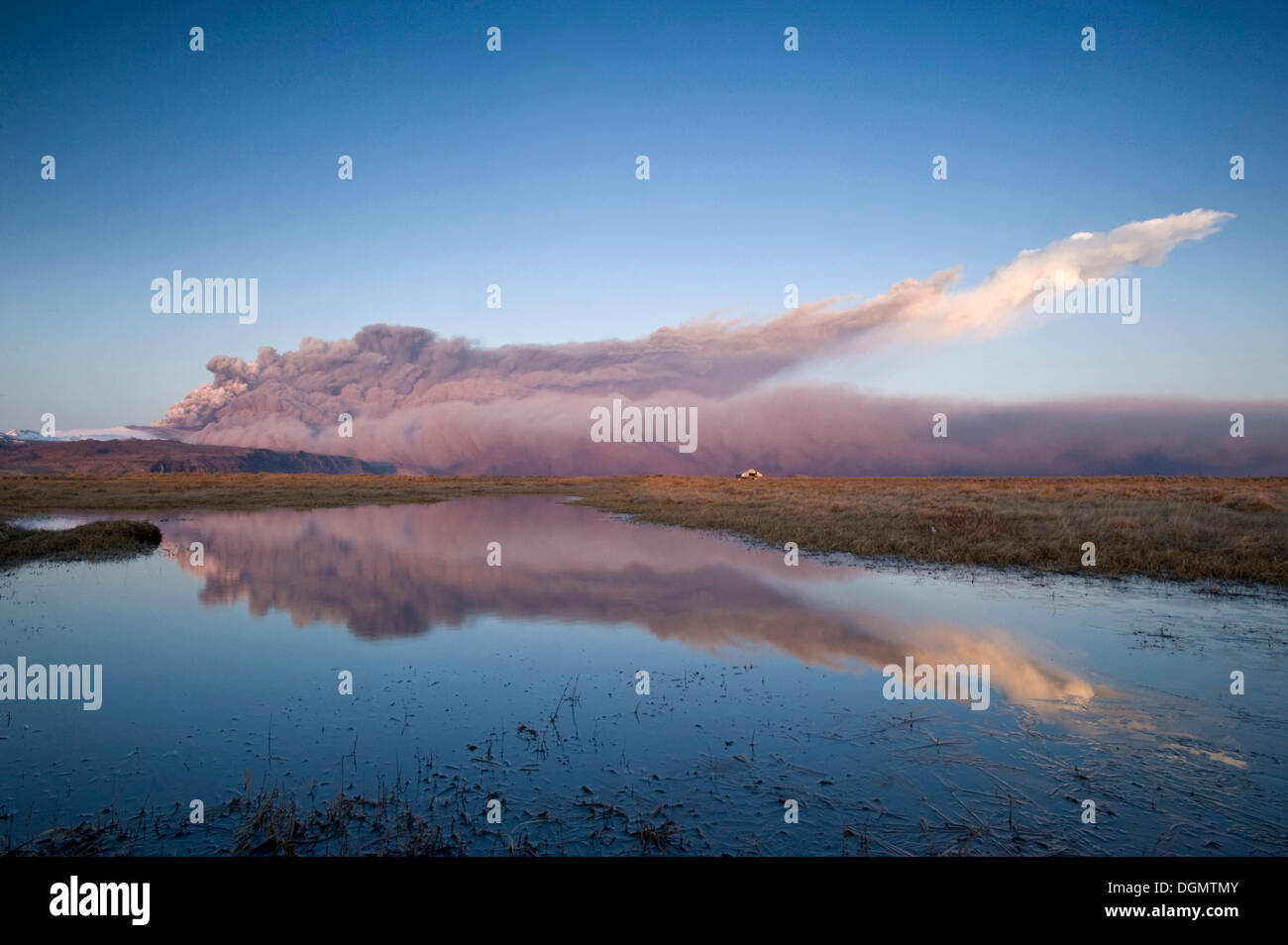 Ash cloud from the Eyjafjallajoekull volcano at sunset ...