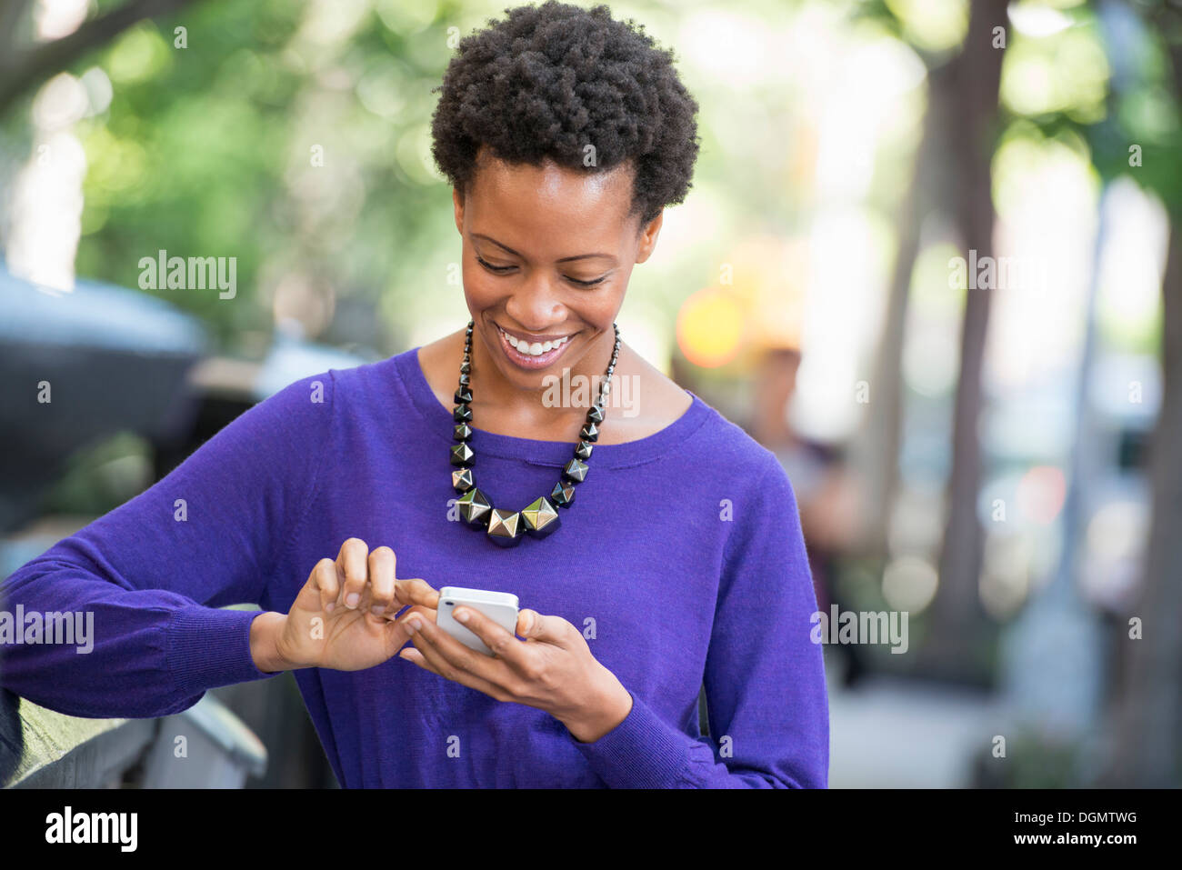 Checking his smart phone hi-res stock photography and images - Alamy