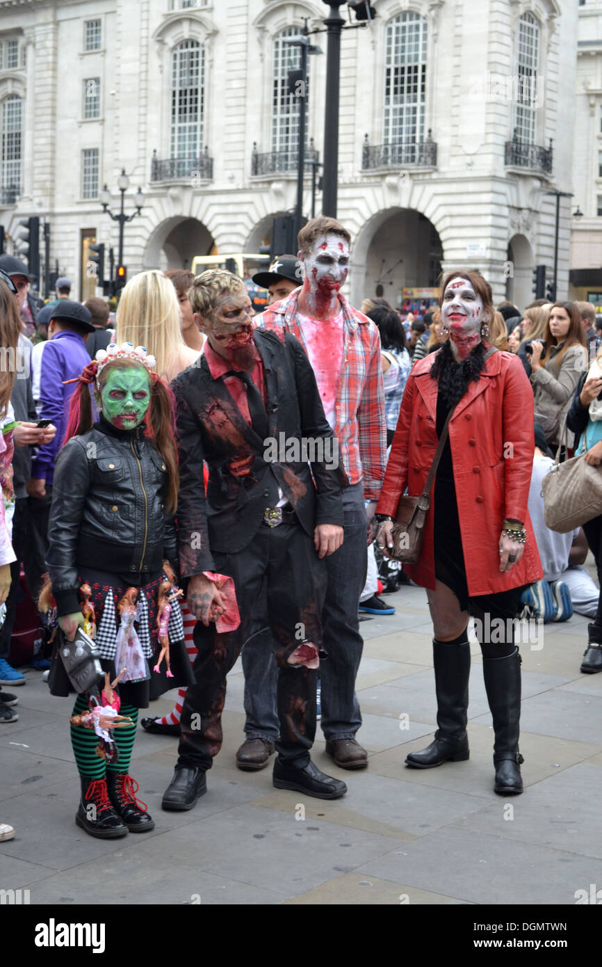 Family dressed as zombies, Piccadilly Circus, London, England. For ...