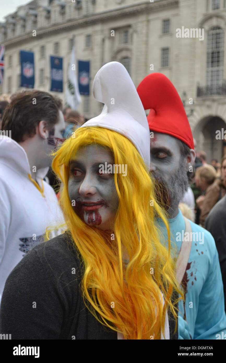 Couple dressed as zombies, Piccadilly Circus, London, England. For ...