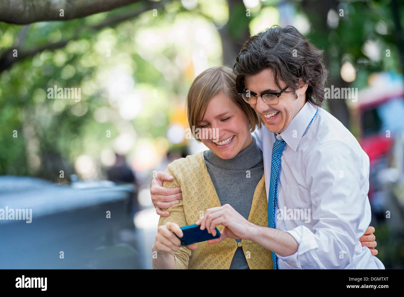 Two people hugging hi-res stock photography and images - Alamy