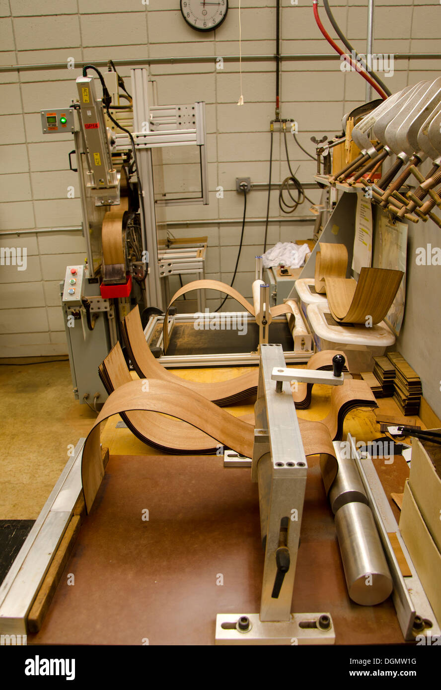 The sides of guitars bend, during production process at Martin guitars ...