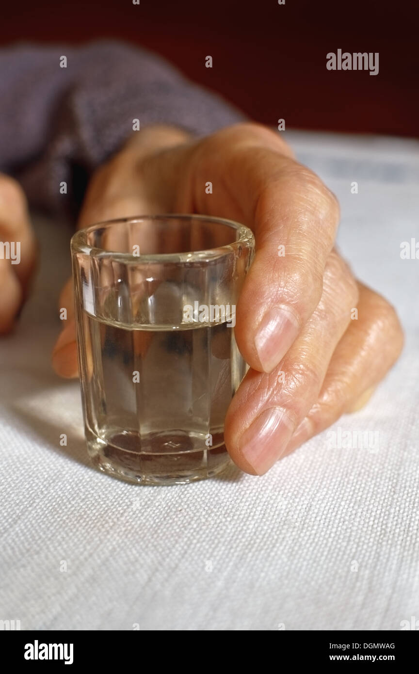 Vodka glass hand hi-res stock photography and images - Alamy