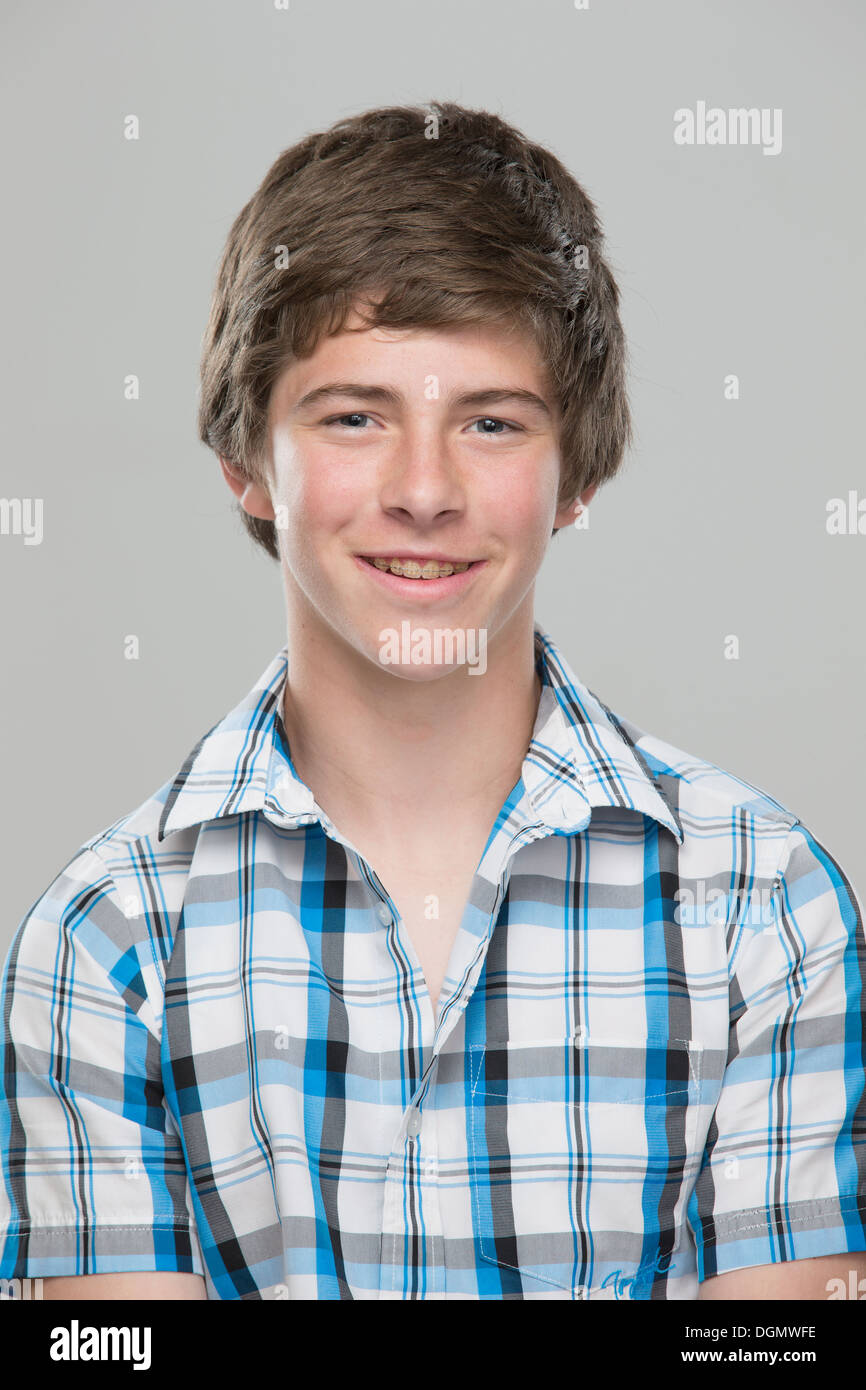 Portrait of teenage boy (14-15) smiling Stock Photo - Alamy