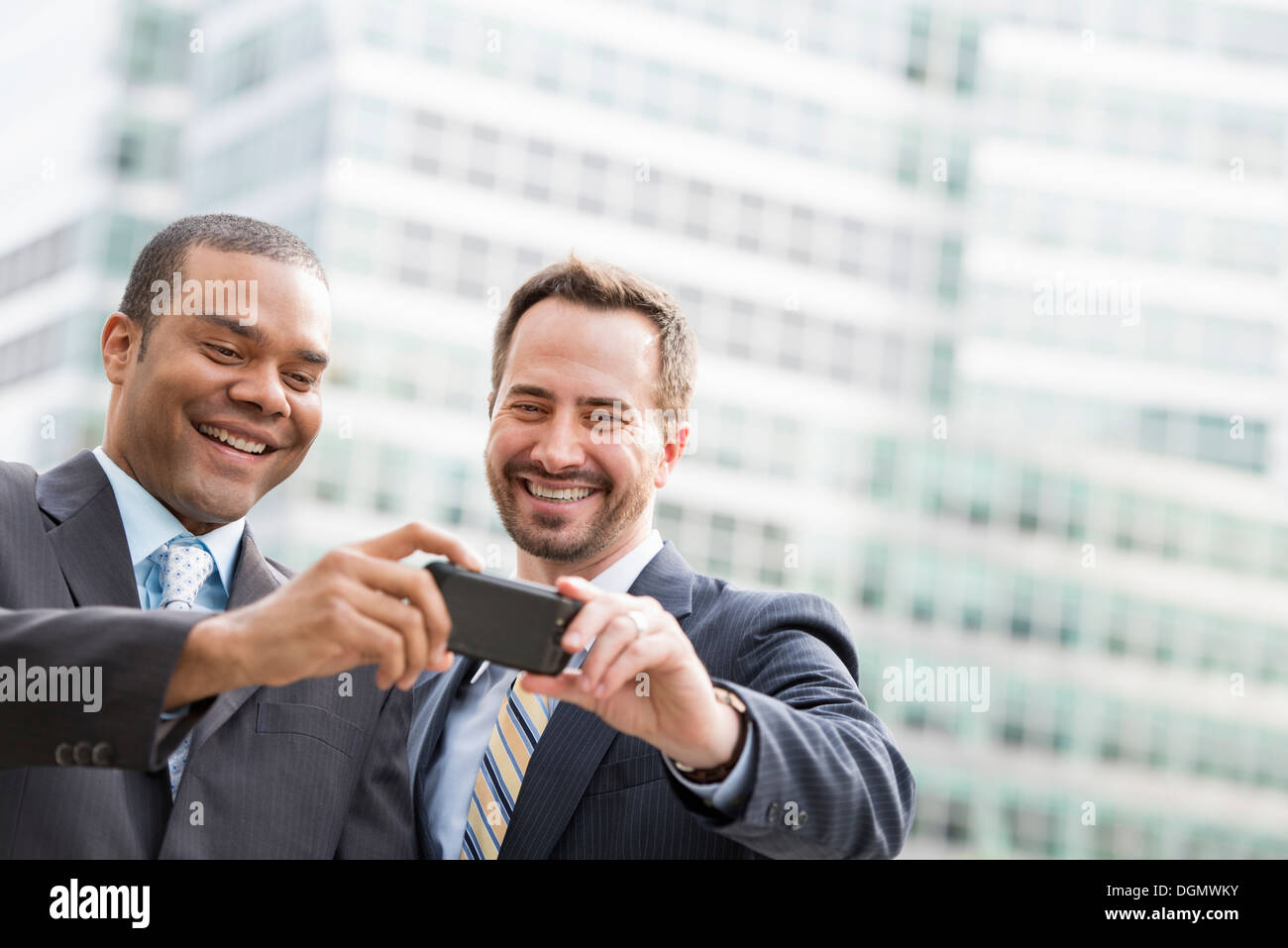 Business men in suits hi-res stock photography and images - Alamy