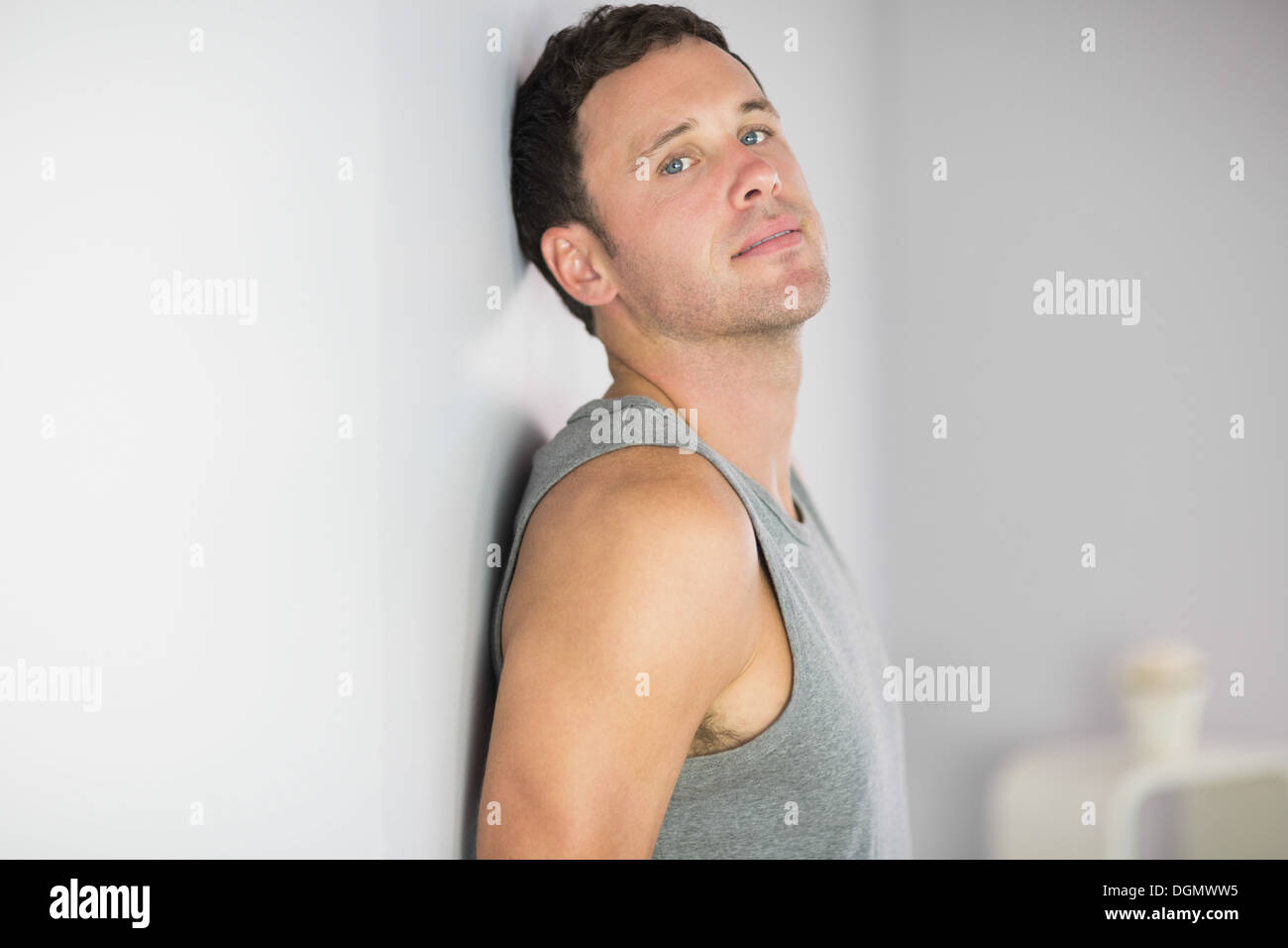 Leaning against wall sitting hi-res stock photography and images - Alamy