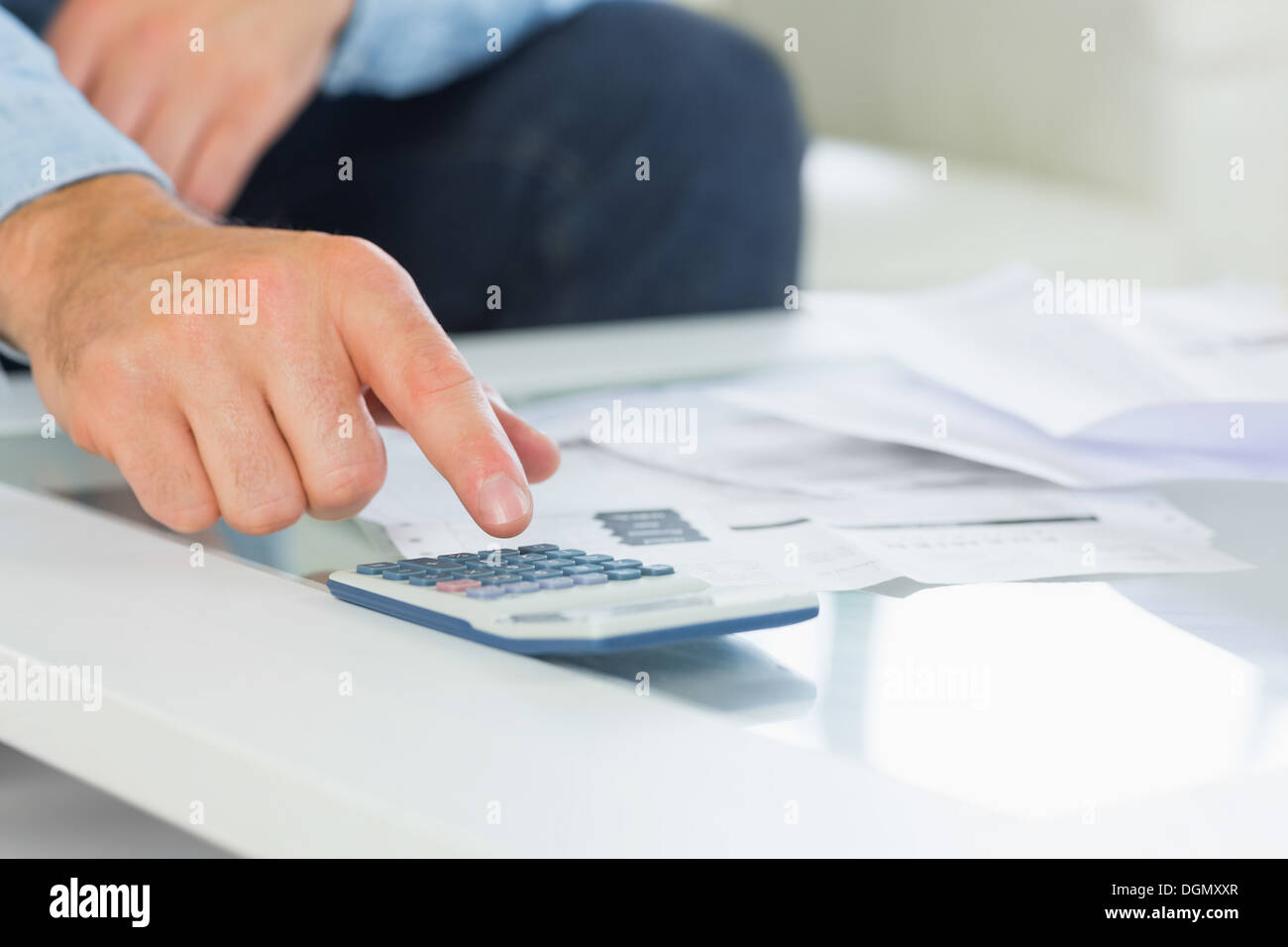 Close up of hand using calculator Stock Photo - Alamy