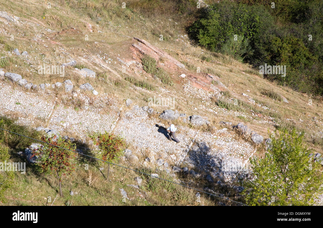 Man walking along ancient cobbled footpath track Grazalema, Cadiz ...