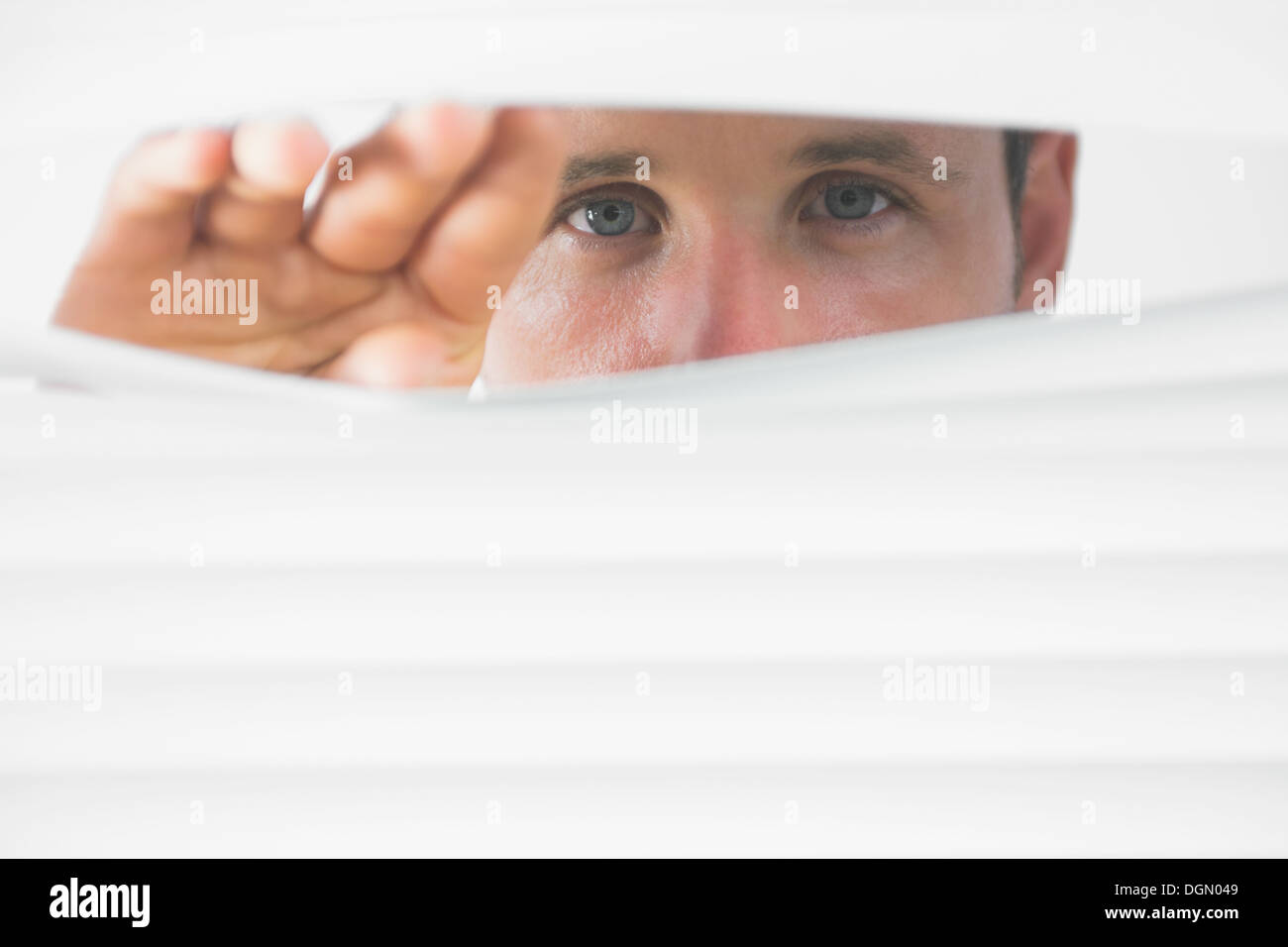 Male eyes observing Stock Photo - Alamy